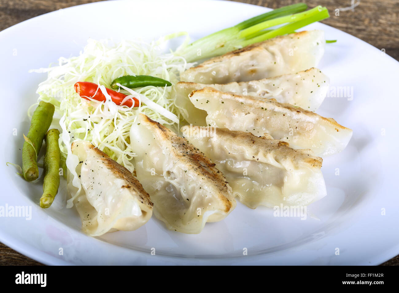 Japanese dumplings with herbs and spices Stock Photo - Alamy