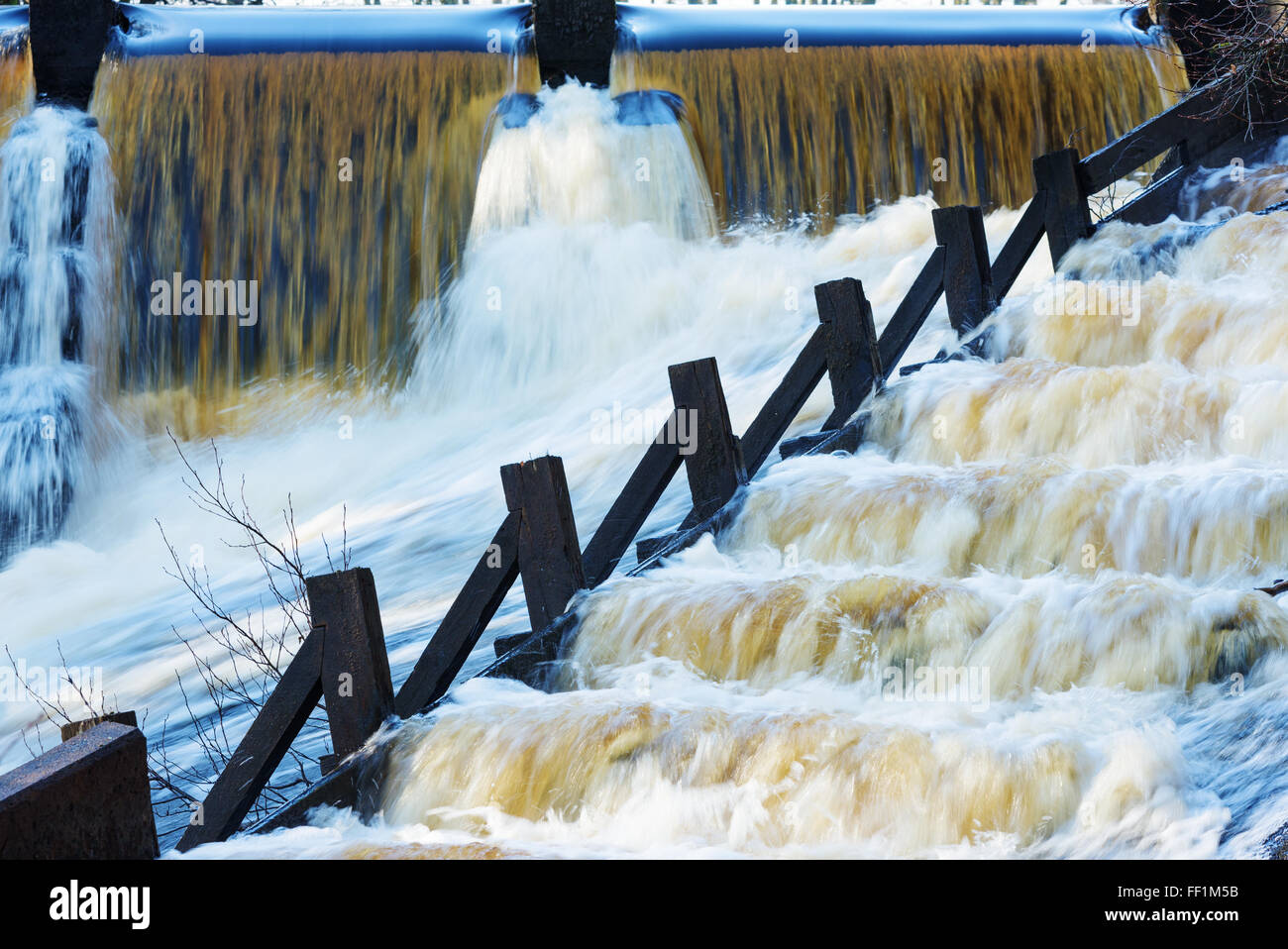 A small fish ladder or salmon ladder to help fish migrate past a dam ...