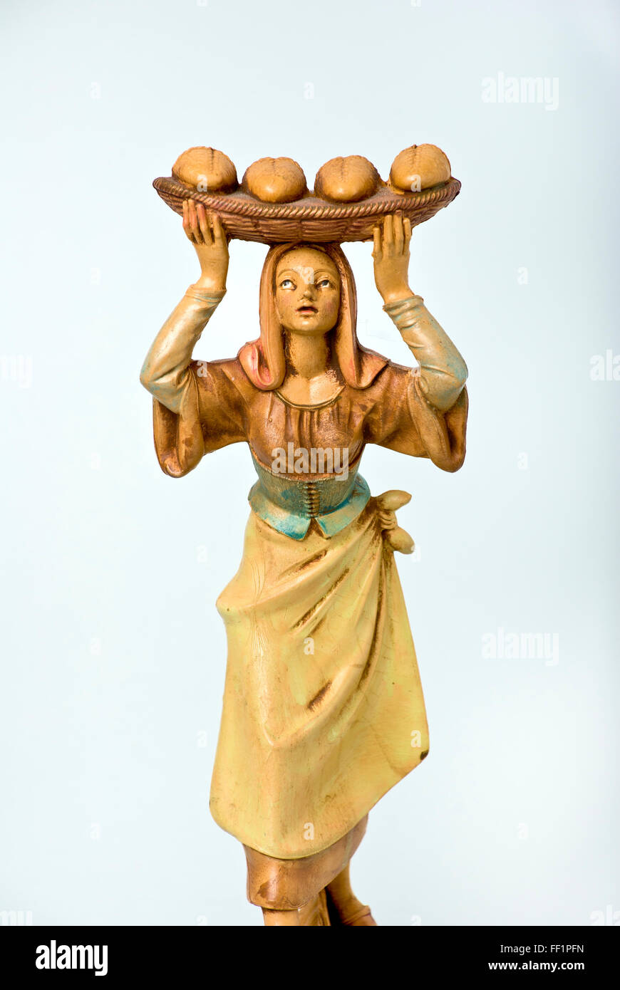 A Neapolitan Prespepi figure of an Italian baker's assistant delivering ...