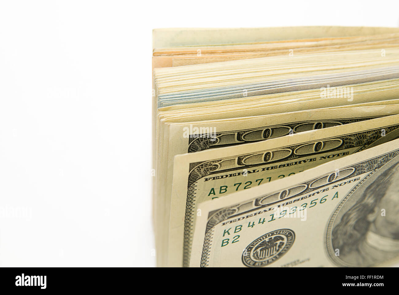 One pack of dollars on over white Stock Photo - Alamy