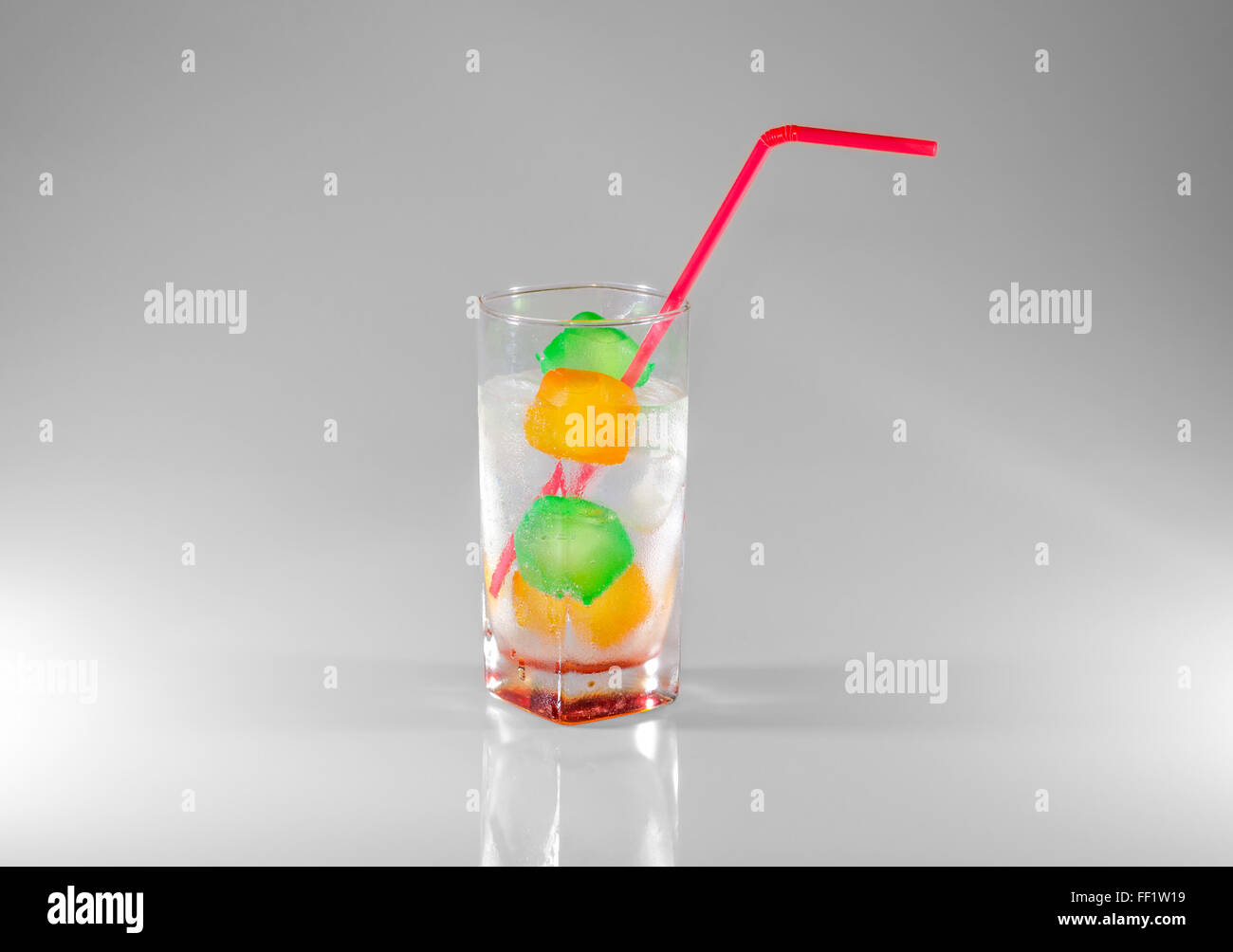 Soda with plastic colorful cubes Stock Photo - Alamy