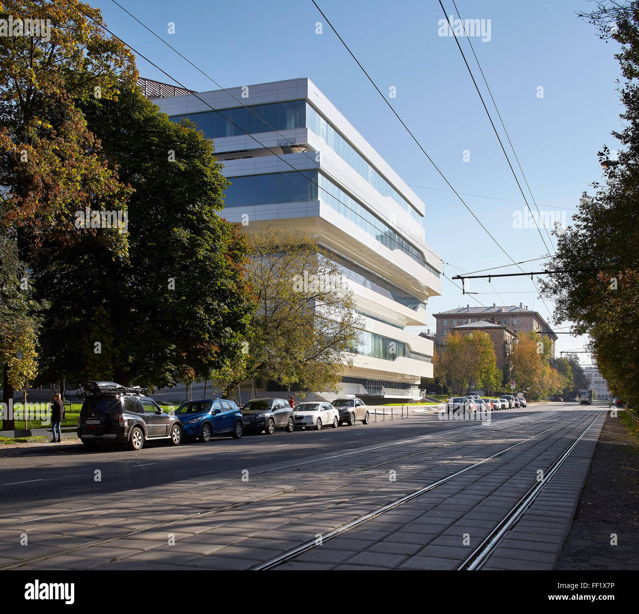 Contextual elevation along street with tram. Dominion Tower, Moscow ...