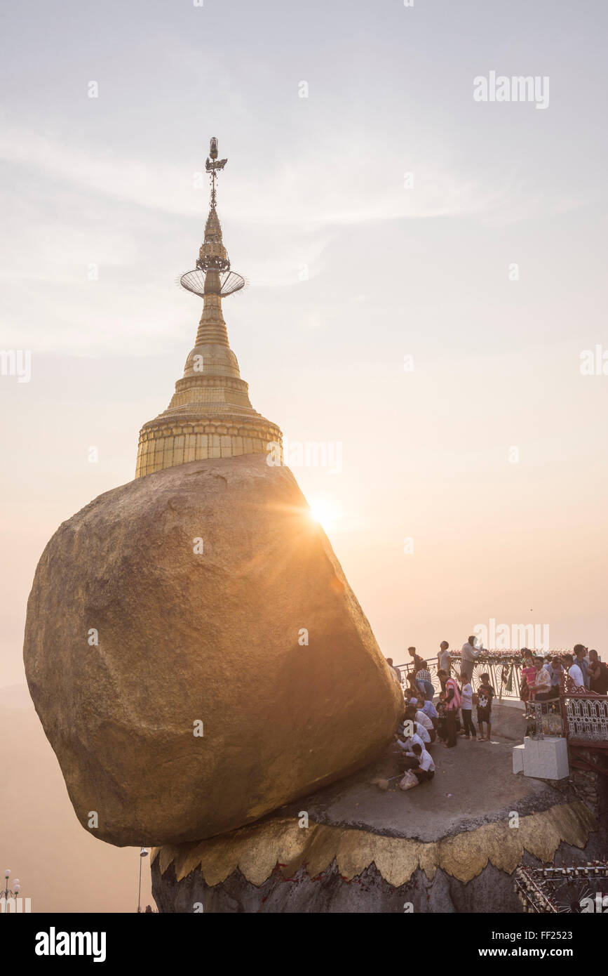 Pilgrims at Golden Rock Stupa (Kyaiktiyo Pagoda) at sunset, Mon State ...