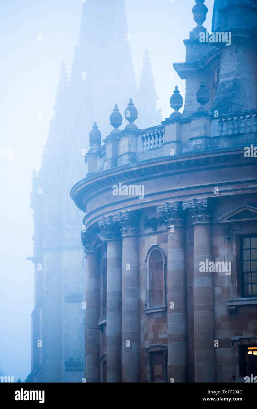 Radcliffe Camera and St. Mary's Church in the mist, Oxford, Oxfordshire ...