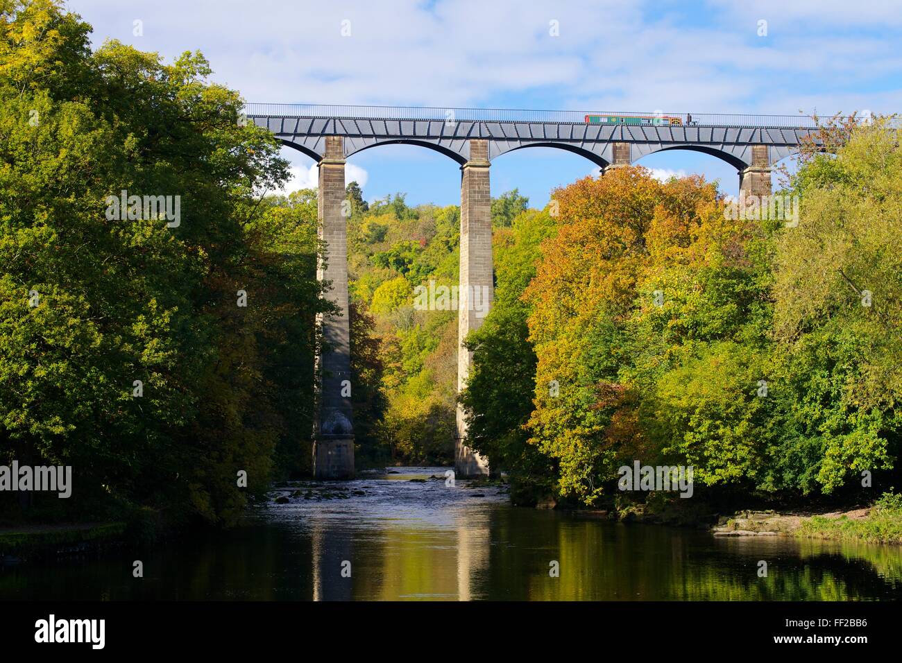 Narrowboat crossing the River Dee in autumn on the Pontcysyllte ...