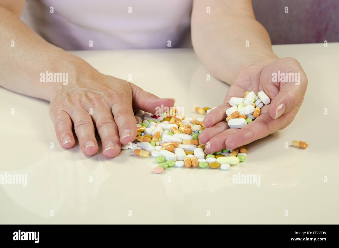 human hand full of colorful medicals Stock Photo - Alamy