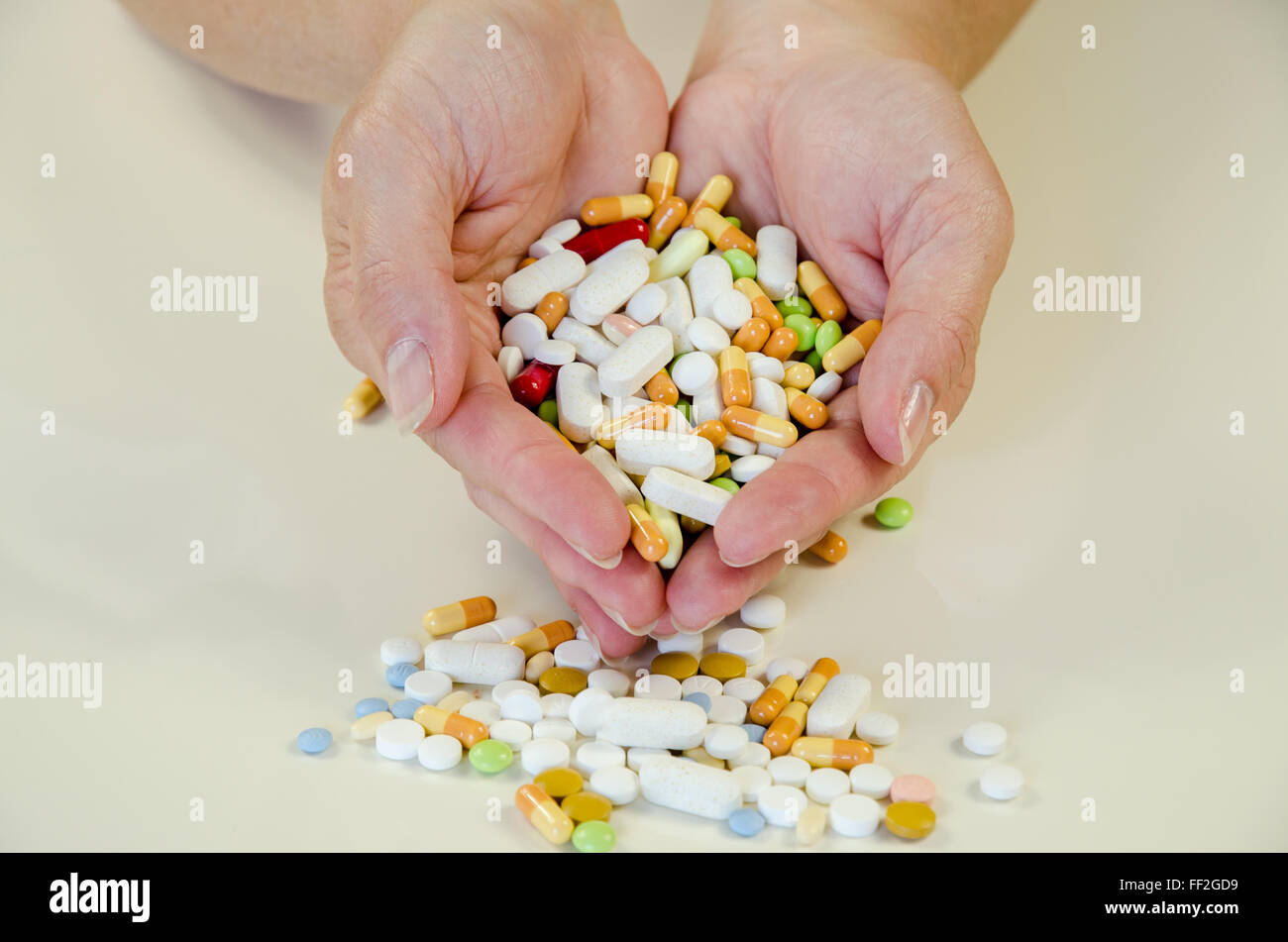 human hand full of colorful medicals Stock Photo - Alamy