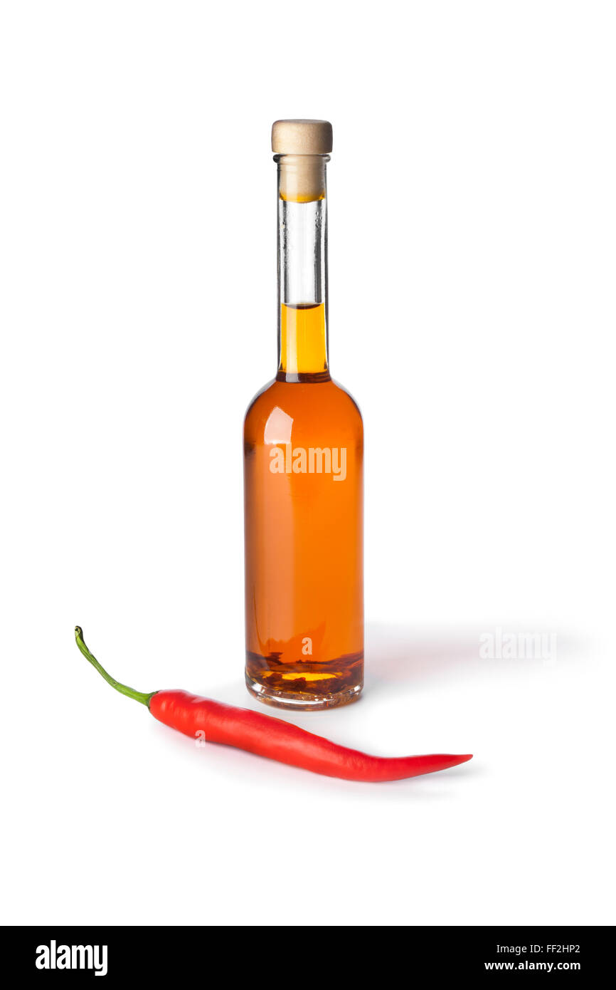 Chili pepper oil on white background Stock Photo - Alamy