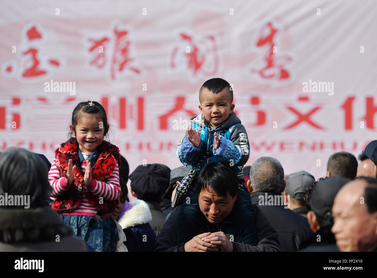 Lanzhou, China's Gansu Province. 10th Feb, 2016. Two children clap ...