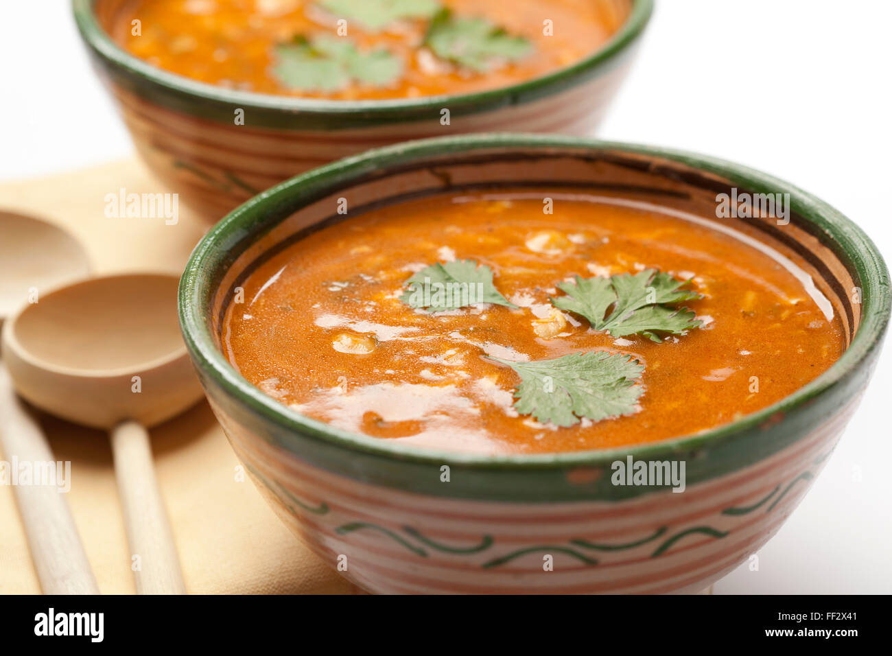 Traditional Moroccan harira soup served in traditional bowls with ...