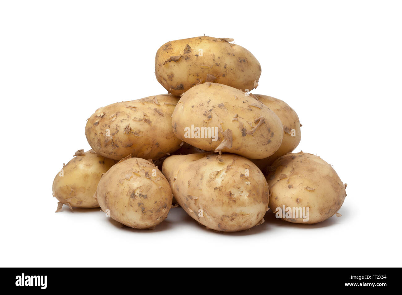 First new potatoes on white background Stock Photo - Alamy