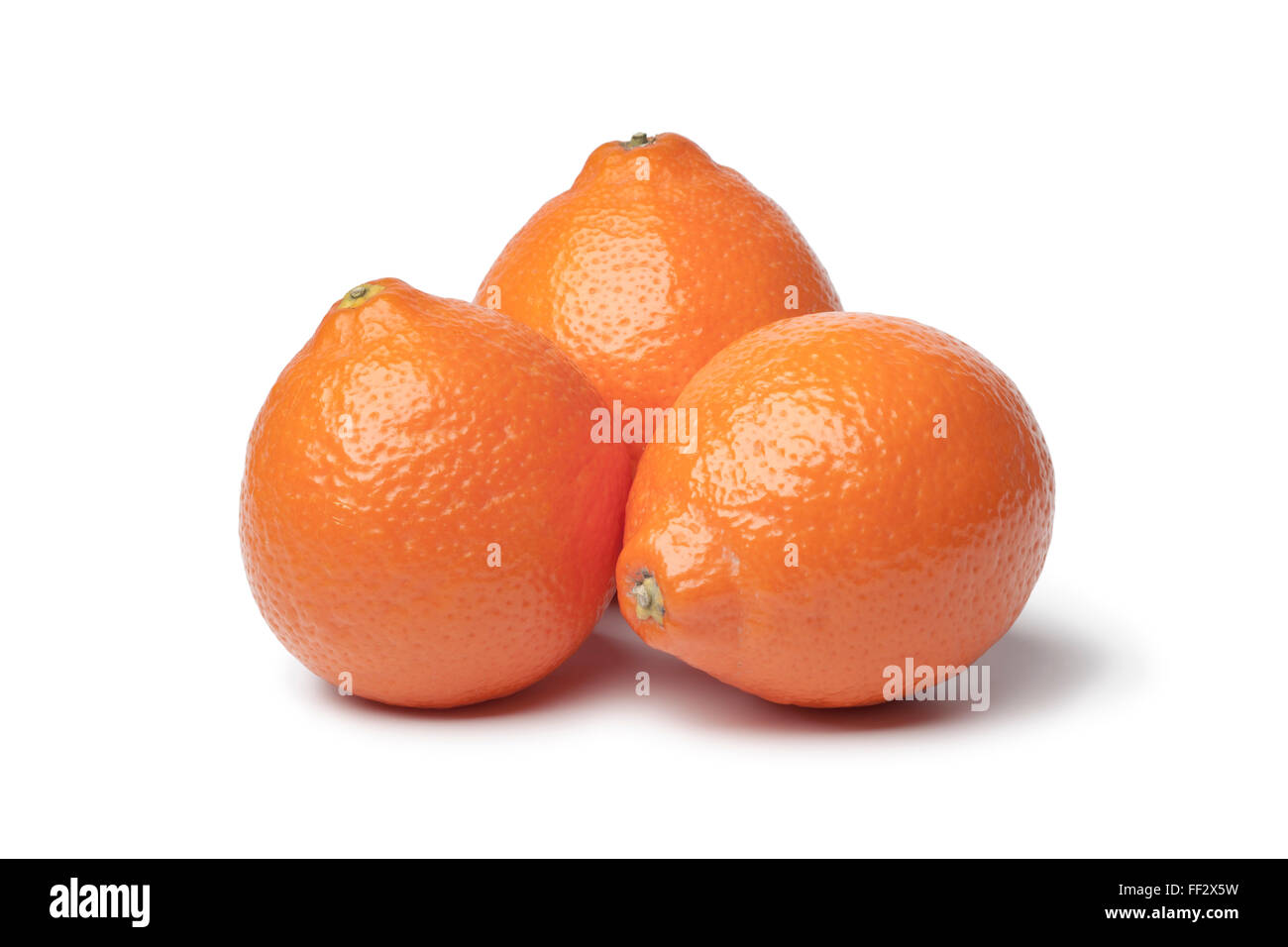 Whole fresh Tangelos on white background Stock Photo - Alamy