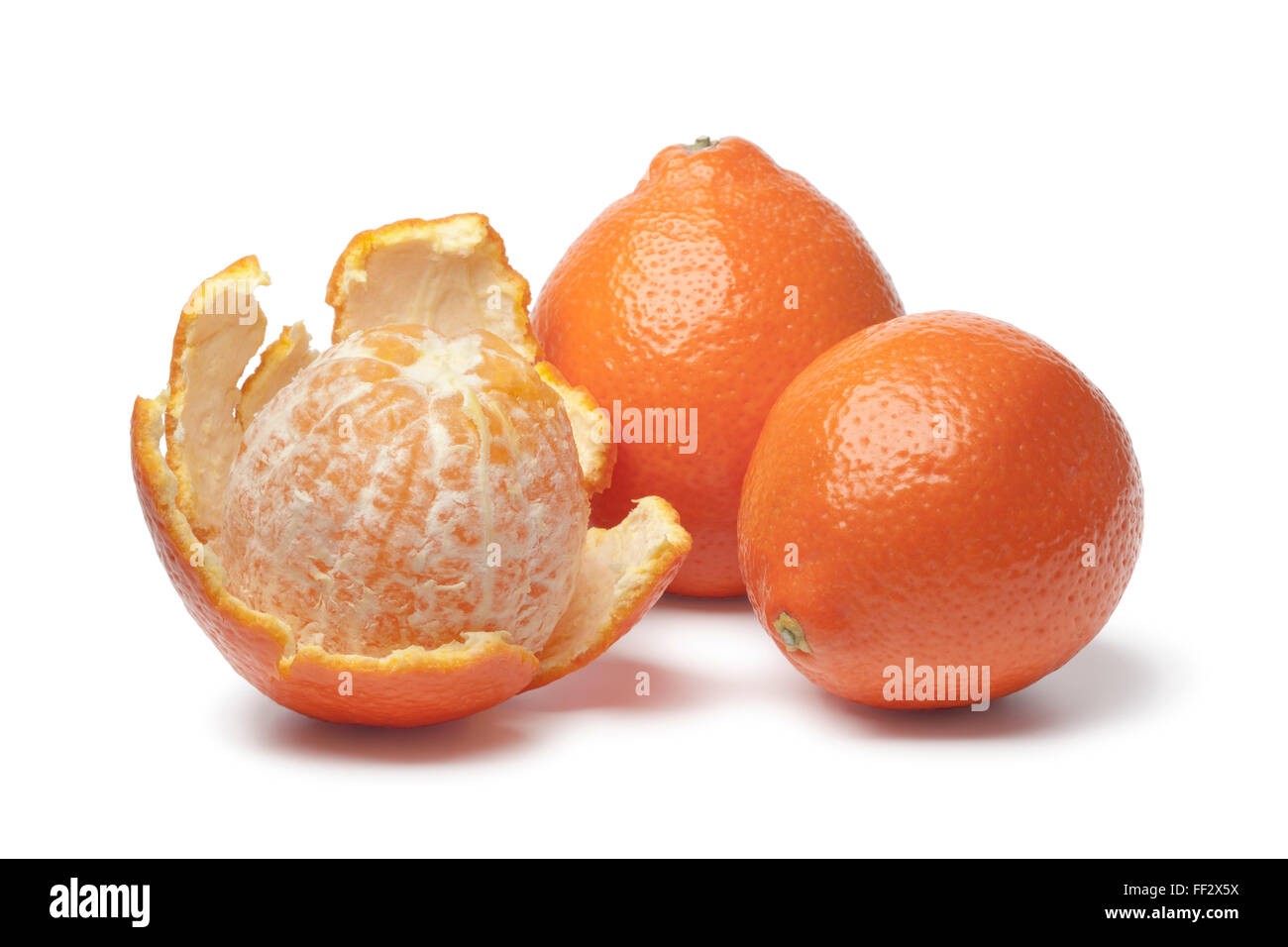 Fresh whole and peeled Tangelo on white background Stock Photo - Alamy