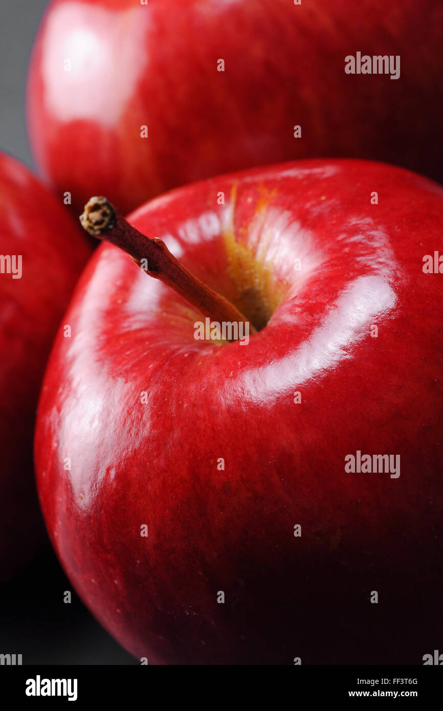 Red apples on white and black background Stock Photo - Alamy