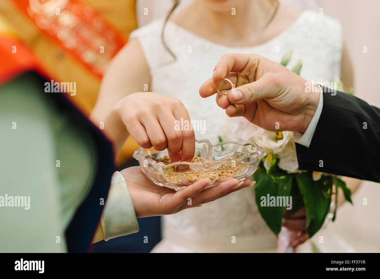 bride and groom are changing rings on their wedding Stock Photo - Alamy