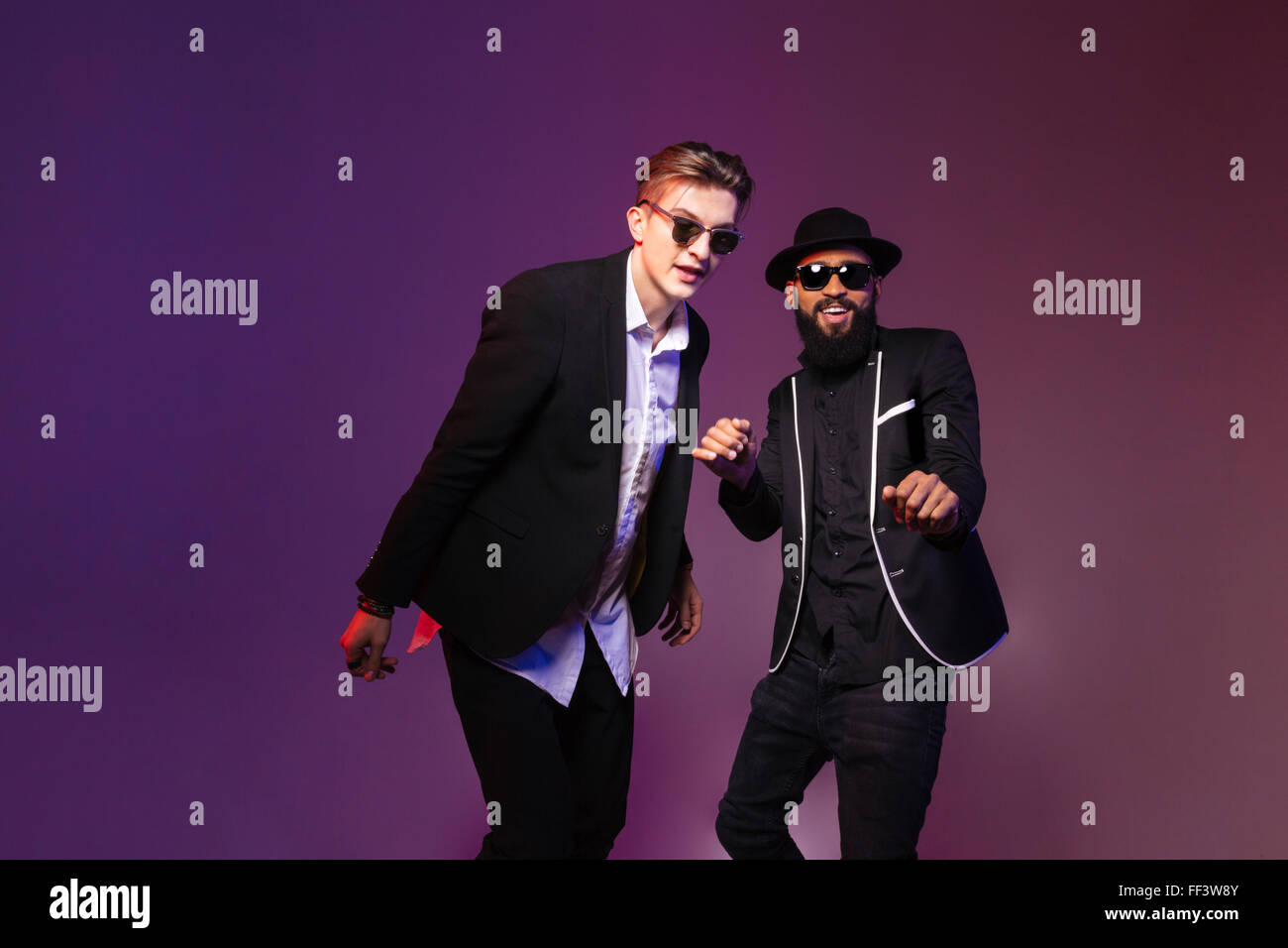 Two men dancing party hi-res stock photography and images - Alamy