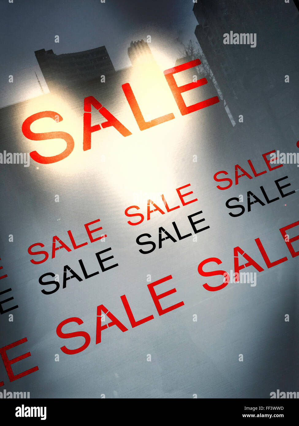 Store's Sale Sign in Store Window on Fifth Avenue, NYC Stock Photo - Alamy