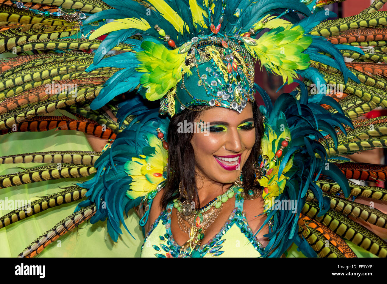 A Female Masquerader enjoys herself in the Harts Carnival presentation ...