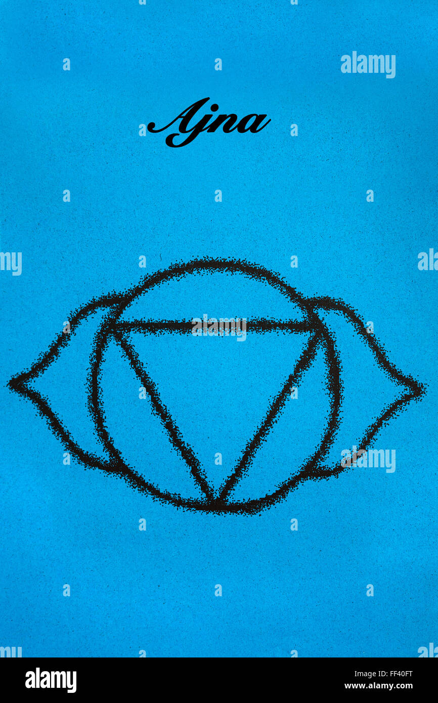 Ajna chakra.Isolated on blue background Stock Photo - Alamy