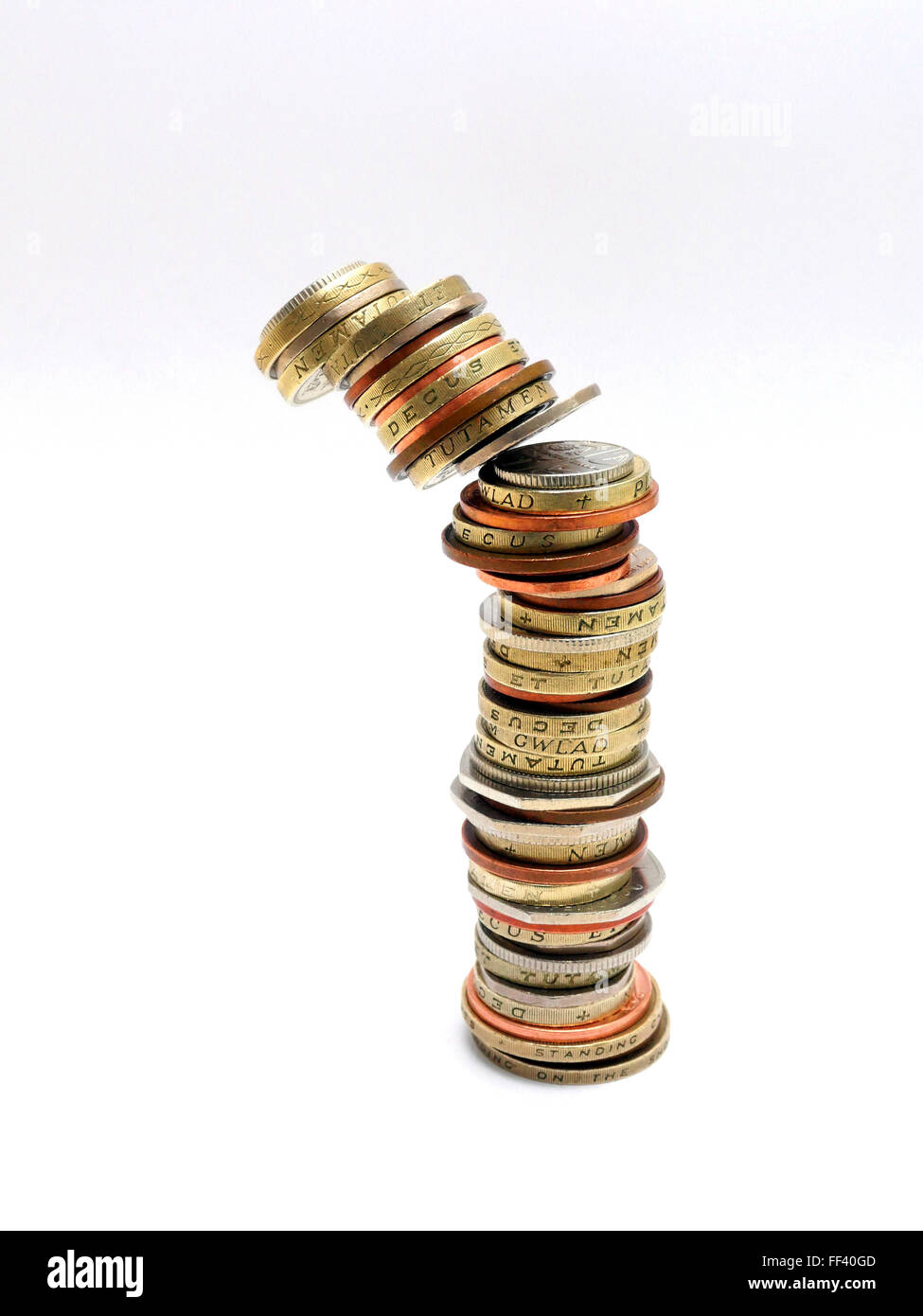 British coins in a pile collapsing Stock Photo - Alamy