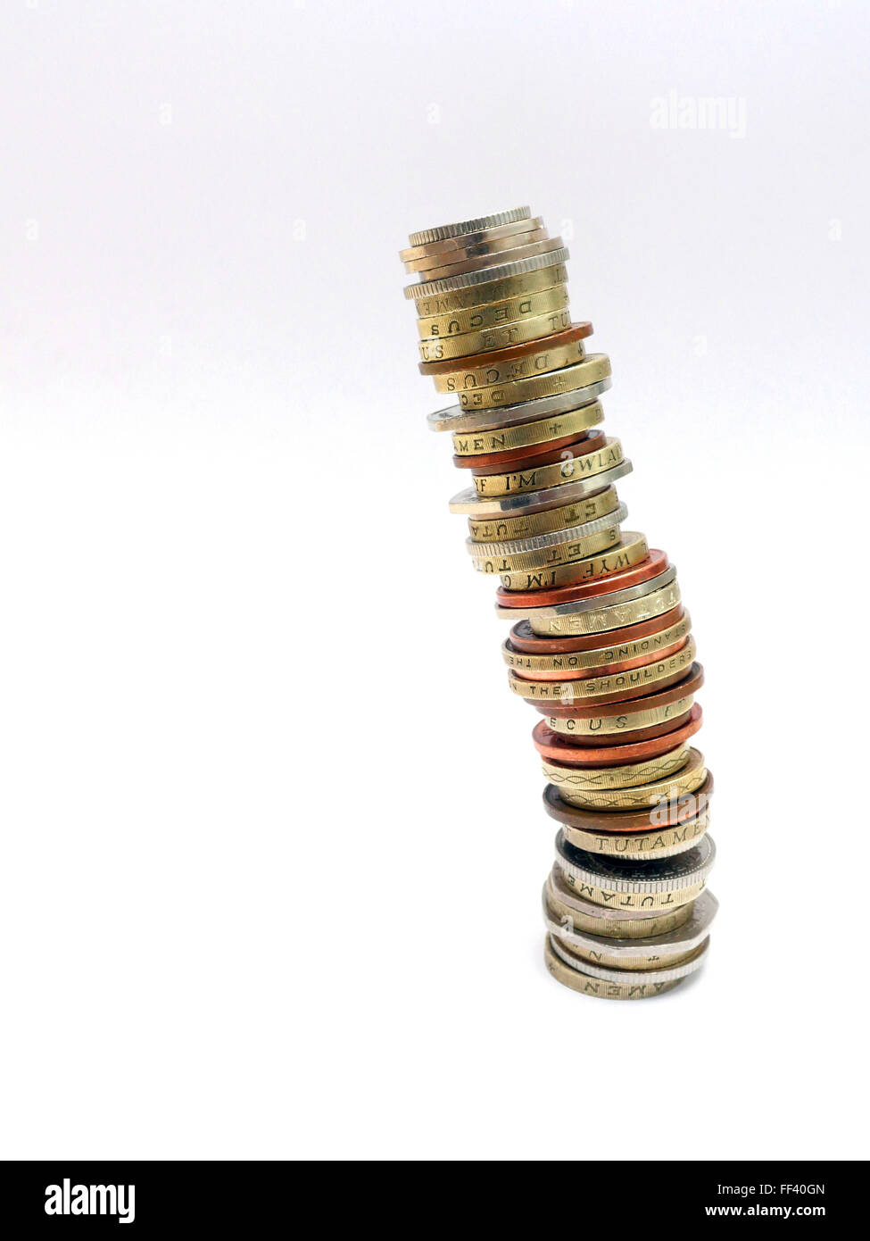 British coins in a pile collapsing Stock Photo - Alamy
