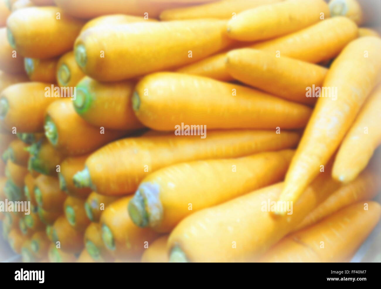 Blurred carrots at a supermarket Stock Photo - Alamy