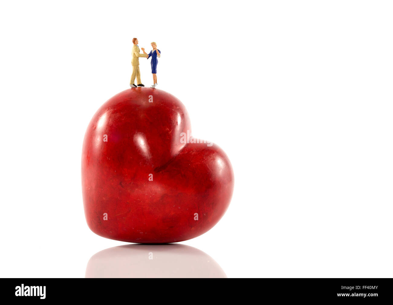 little puppets love couple dance on red heart for valentines day card ...