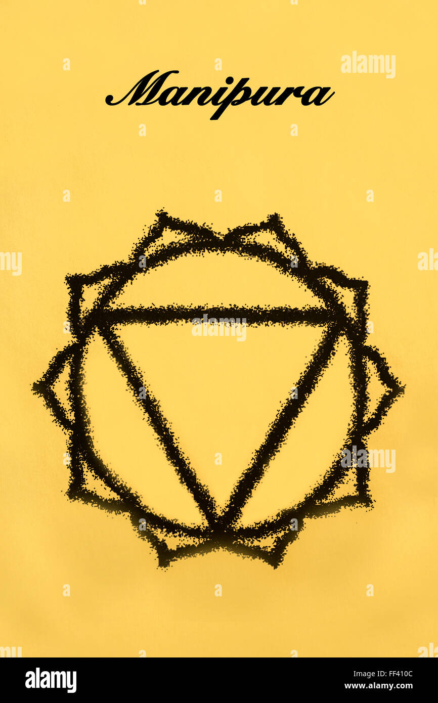 Manipura chakra.Isolated on yellow background Stock Photo - Alamy