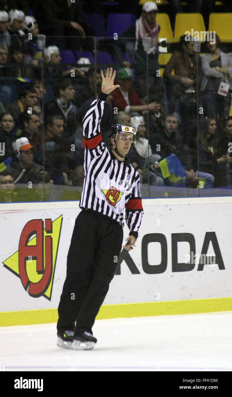KYIV, UKRAINE - APRIL 23, 2011: Referee David Lewis raise his hand ...