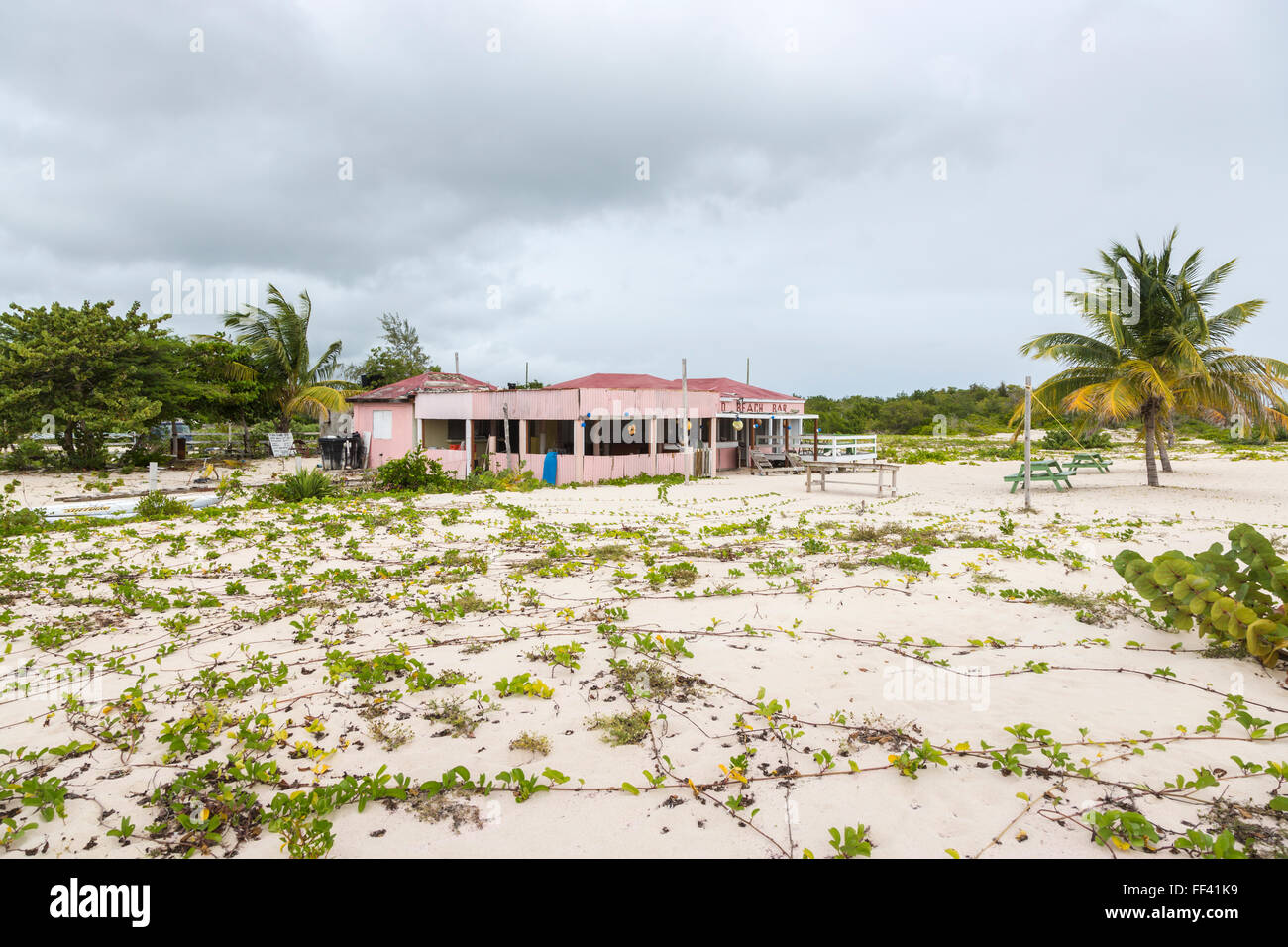 Deserted and overgrown Pink Sand Beach Bar on the coast in the south of ...