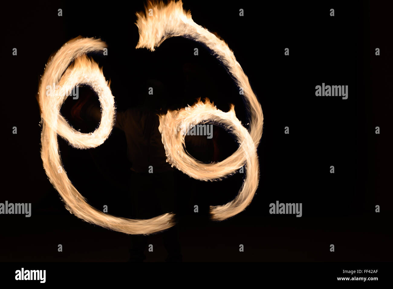 Fire poin in action by a male performance in Thai restaurant Stock ...