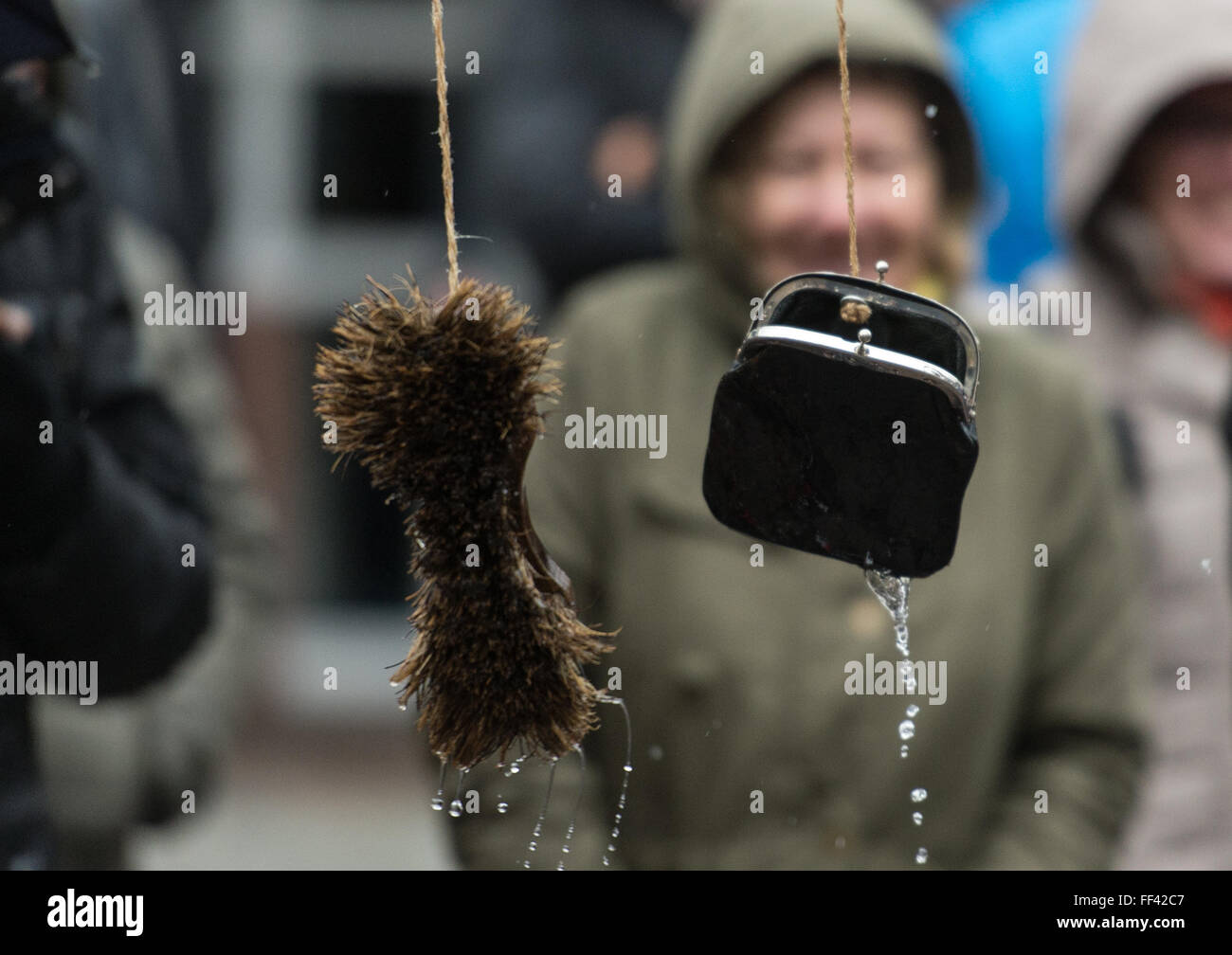 Wolfach, Germany. 10th Feb, 2016. Water drips from a wallet and a brush ...