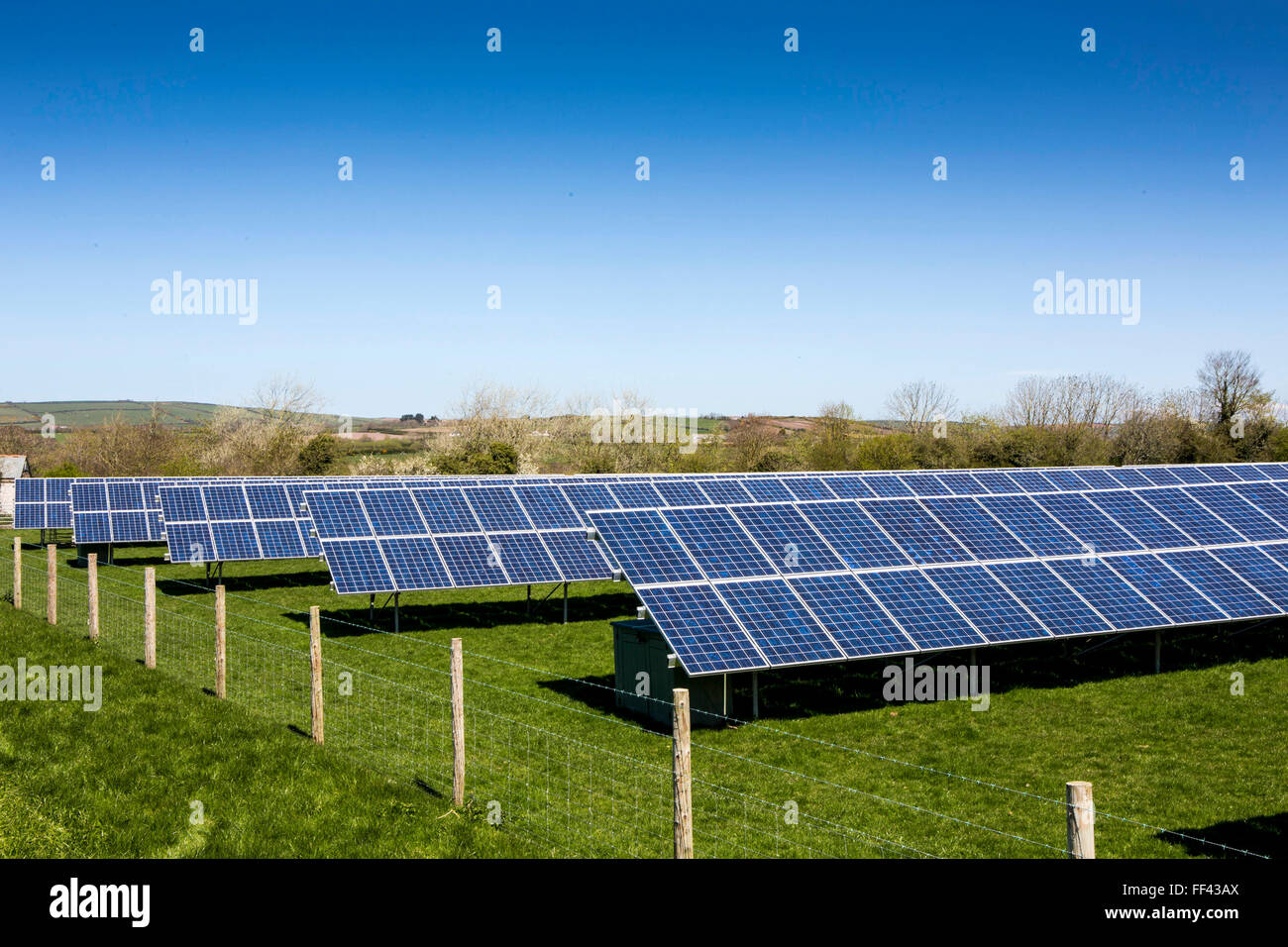 Rows of photovoltaic solar panels in a field for electricity production ...