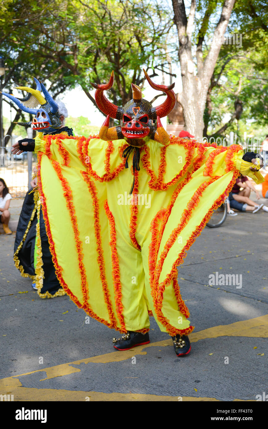 Traditional masked cultural figure VEJIGANTE during the carnival parade ...