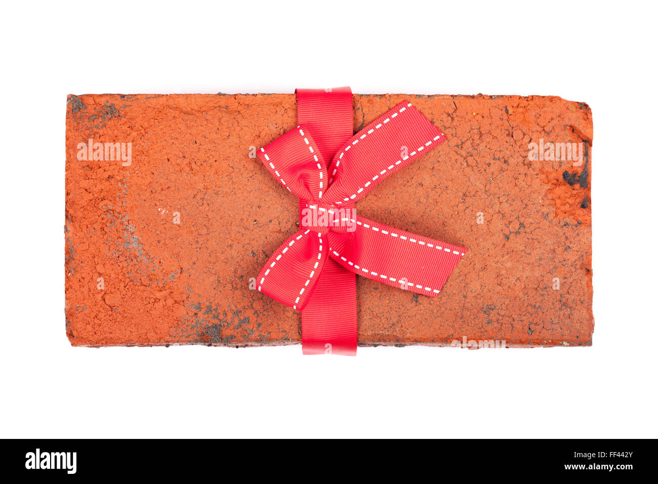 brick in a gift with bow ribbon top view isolated Stock Photo - Alamy