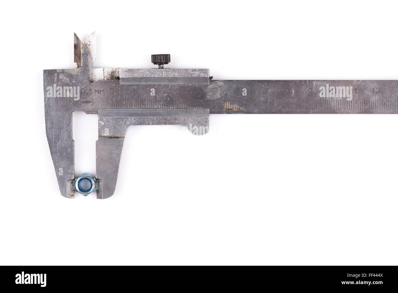 caliper and nut closeup isolated on white background Stock Photo - Alamy