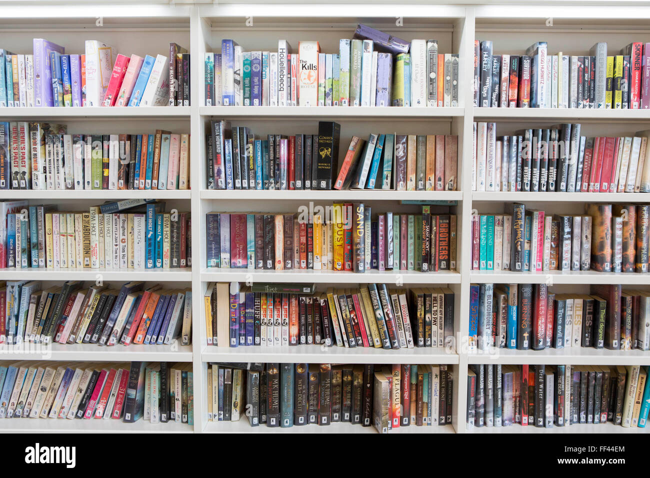 Book shelves with integrated lighting inside the library of the Hive in ...