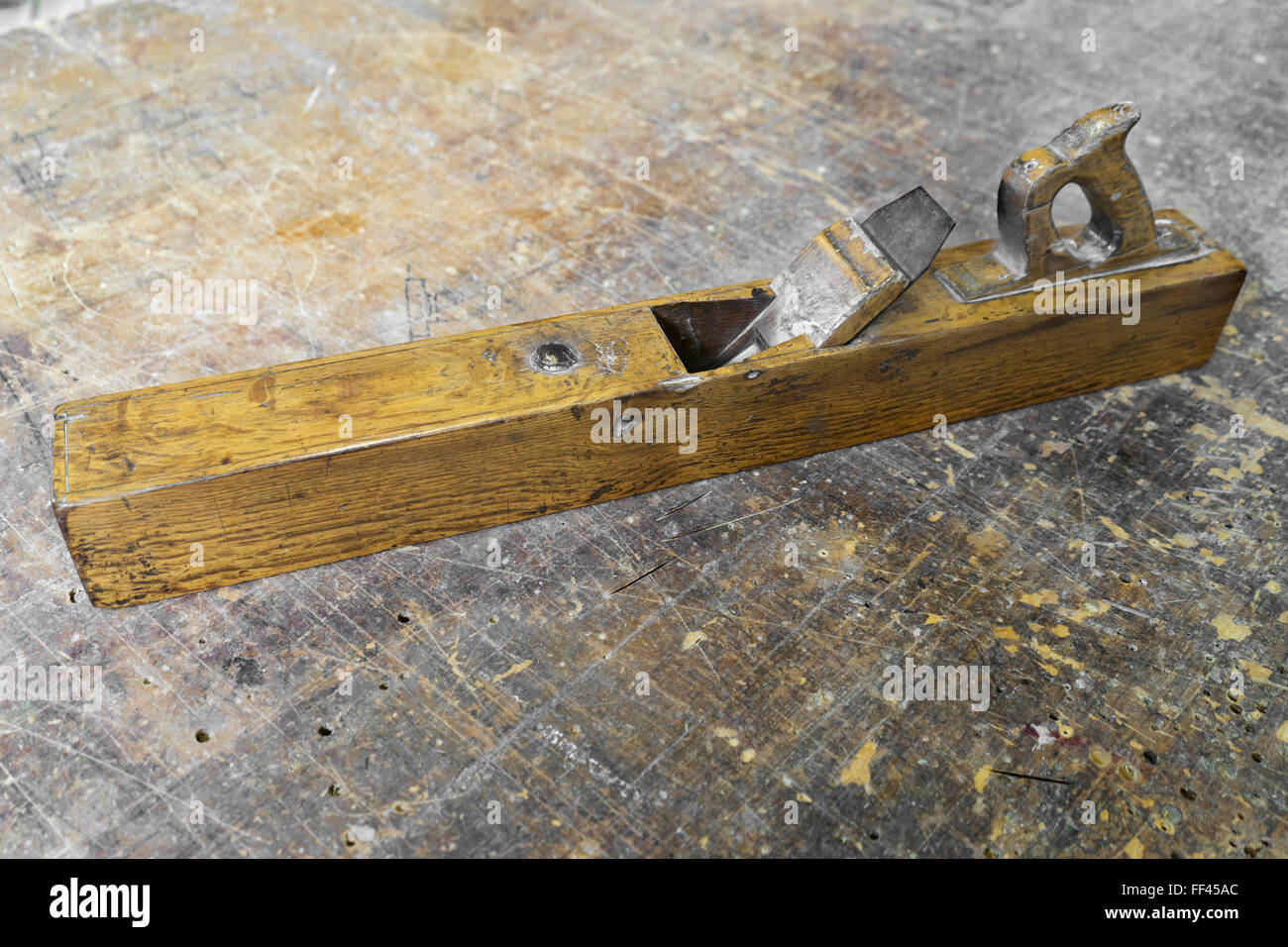 Old carpenter tool planer on a vintage wooden background Stock Photo ...