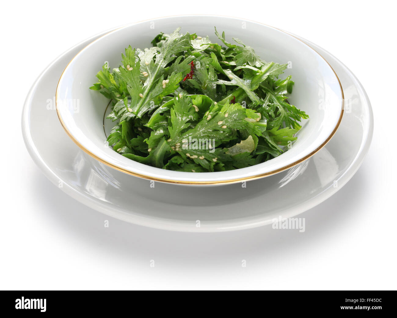 crown daisy salad with sesame isolated on white background Stock Photo ...