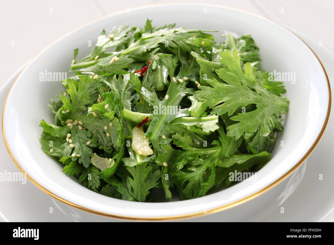 crown daisy salad with sesame Stock Photo - Alamy