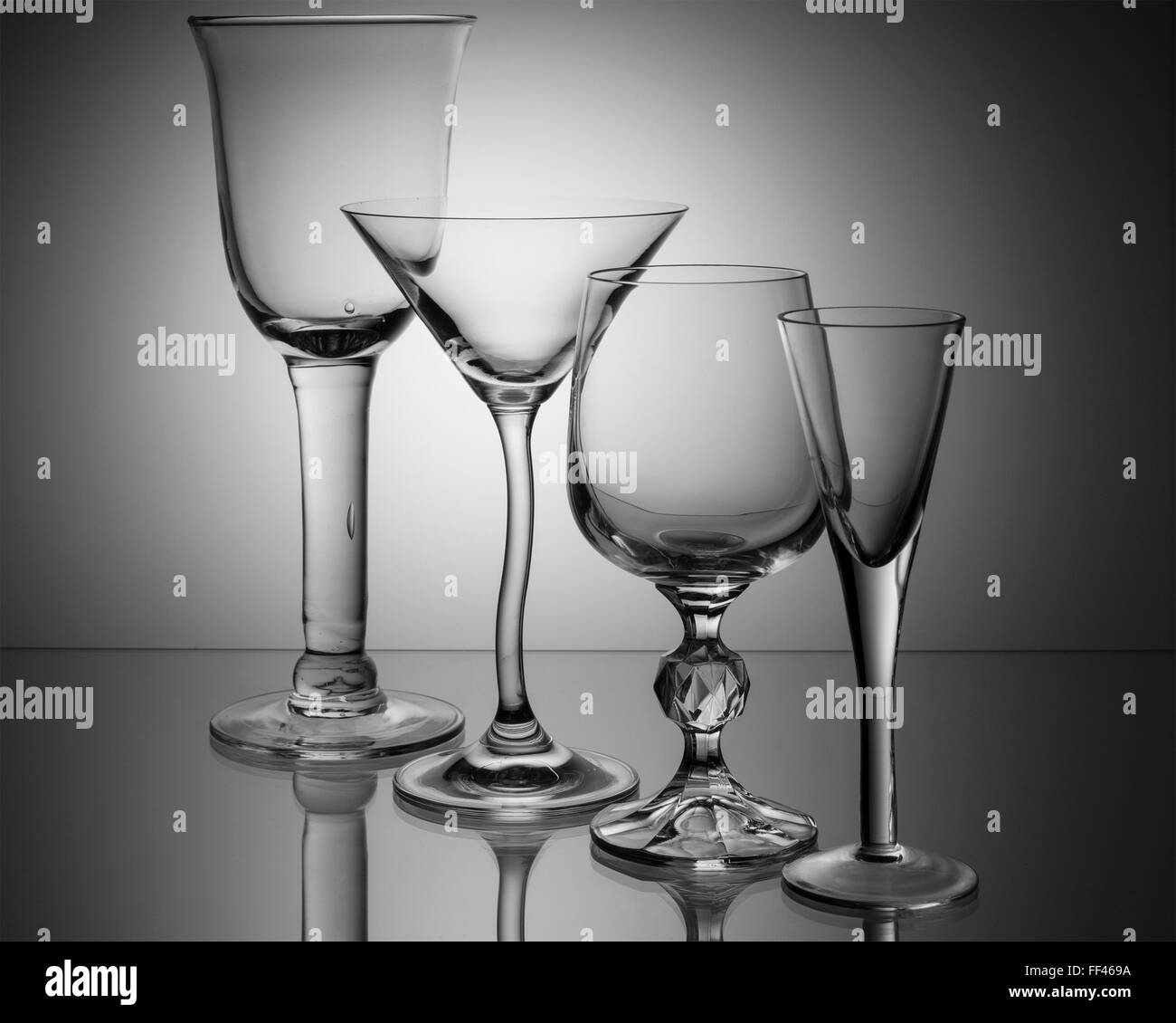 Empty glasses of different kind Stock Photo - Alamy