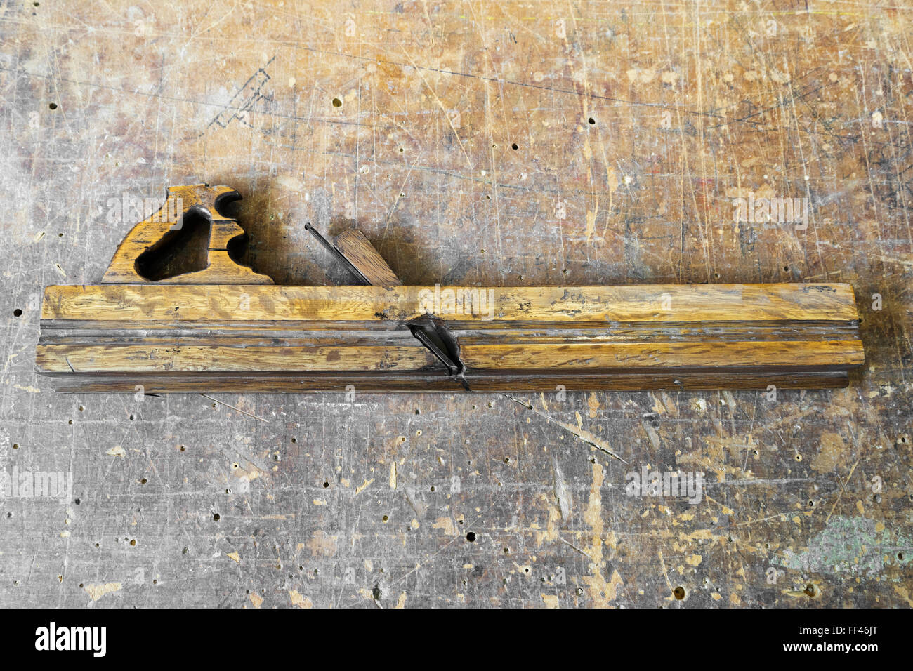 Old carpenter tool planer on a vintage wooden background Stock Photo ...
