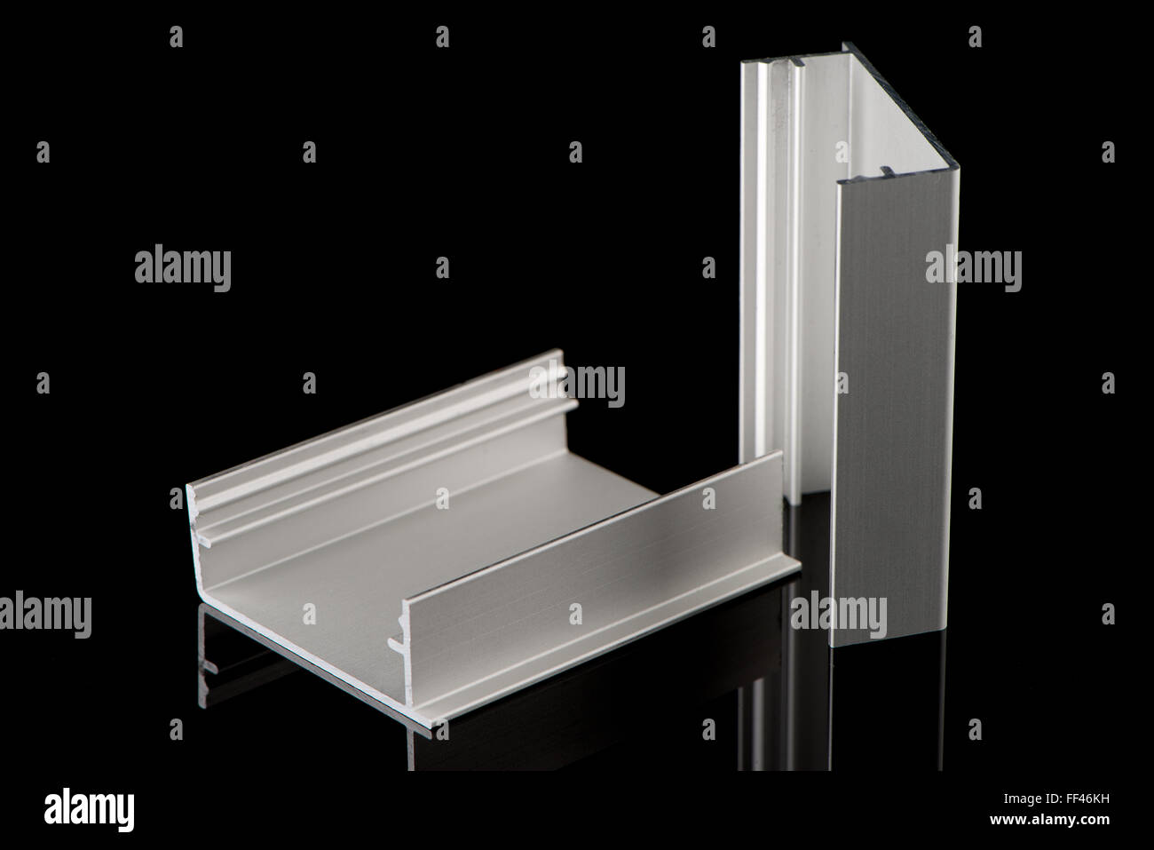 Aluminium profile sample isolated on black background Stock Photo - Alamy