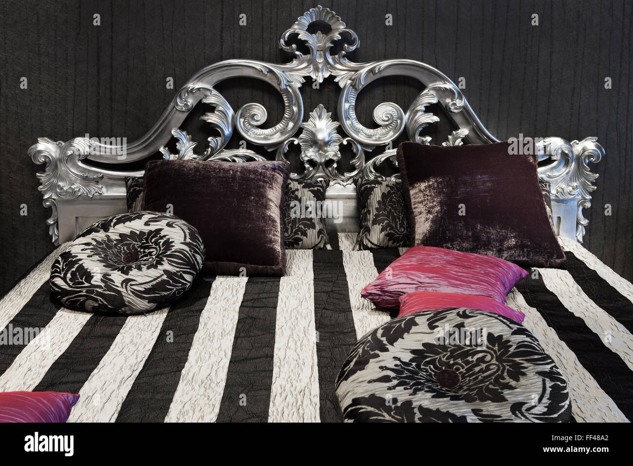 beautiful and fashionable bed in a modern bedroom Stock Photo - Alamy