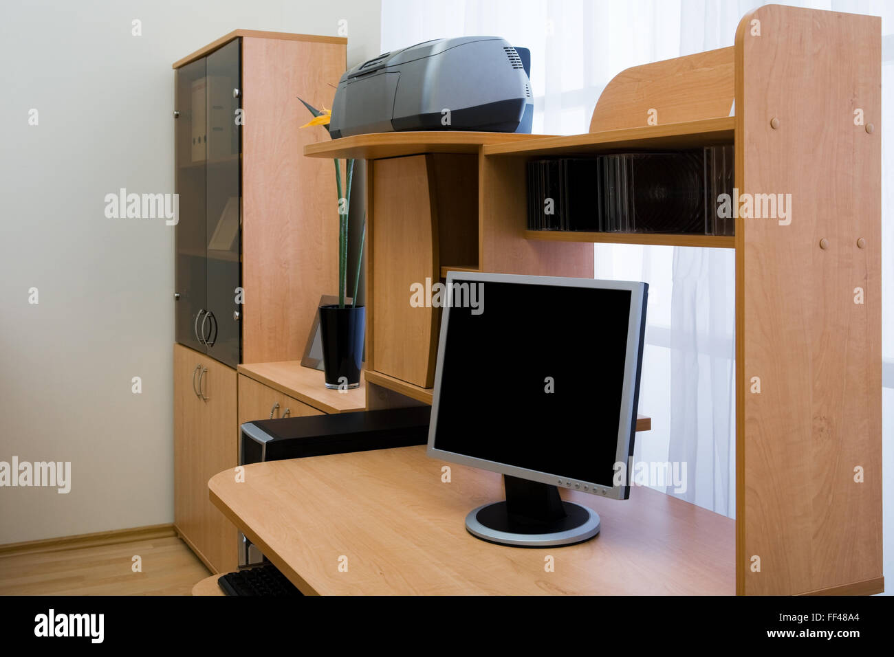 Modern computer on a desk near the window Stock Photo - Alamy