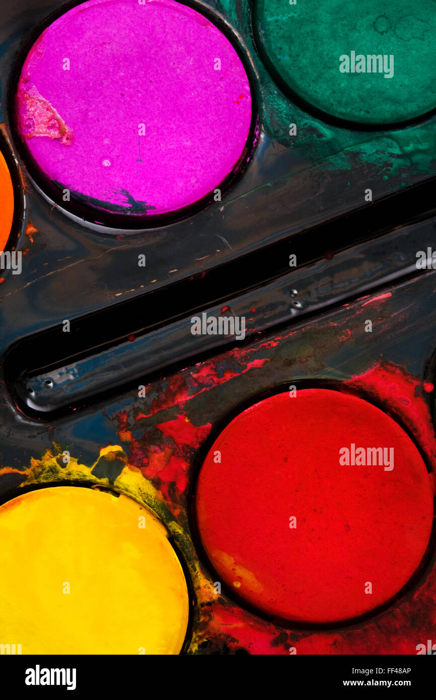 Color paints in a black plastic box Stock Photo - Alamy