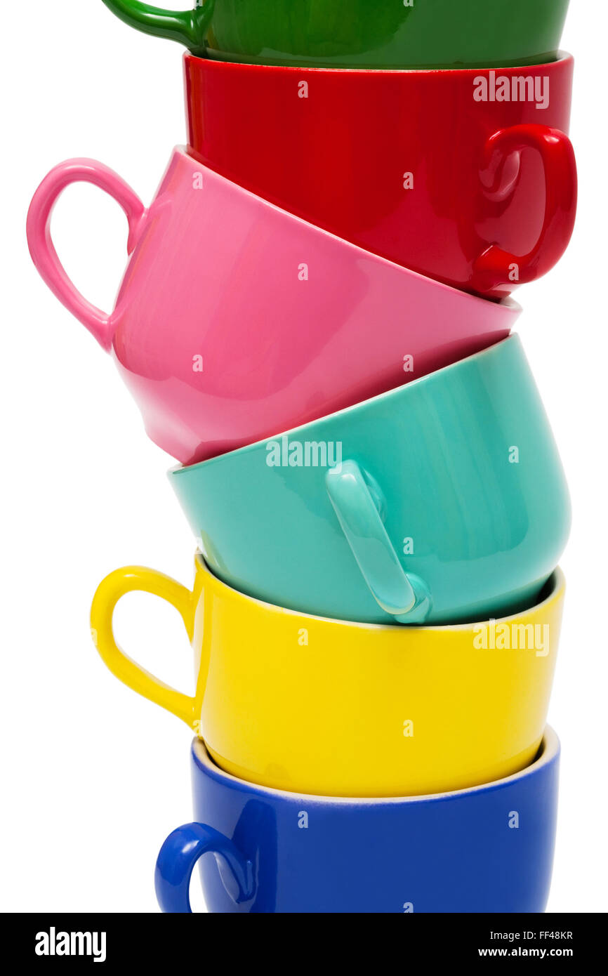 Beautiful color cups on a white background Stock Photo - Alamy