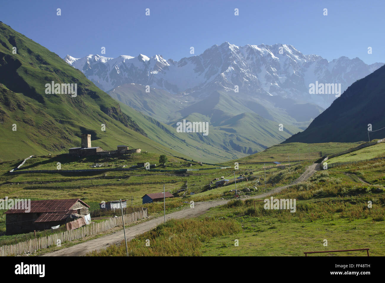 Ushguli, Lamaria church, Mount Shkhara, Mount Dzhangi Tau, morning ...