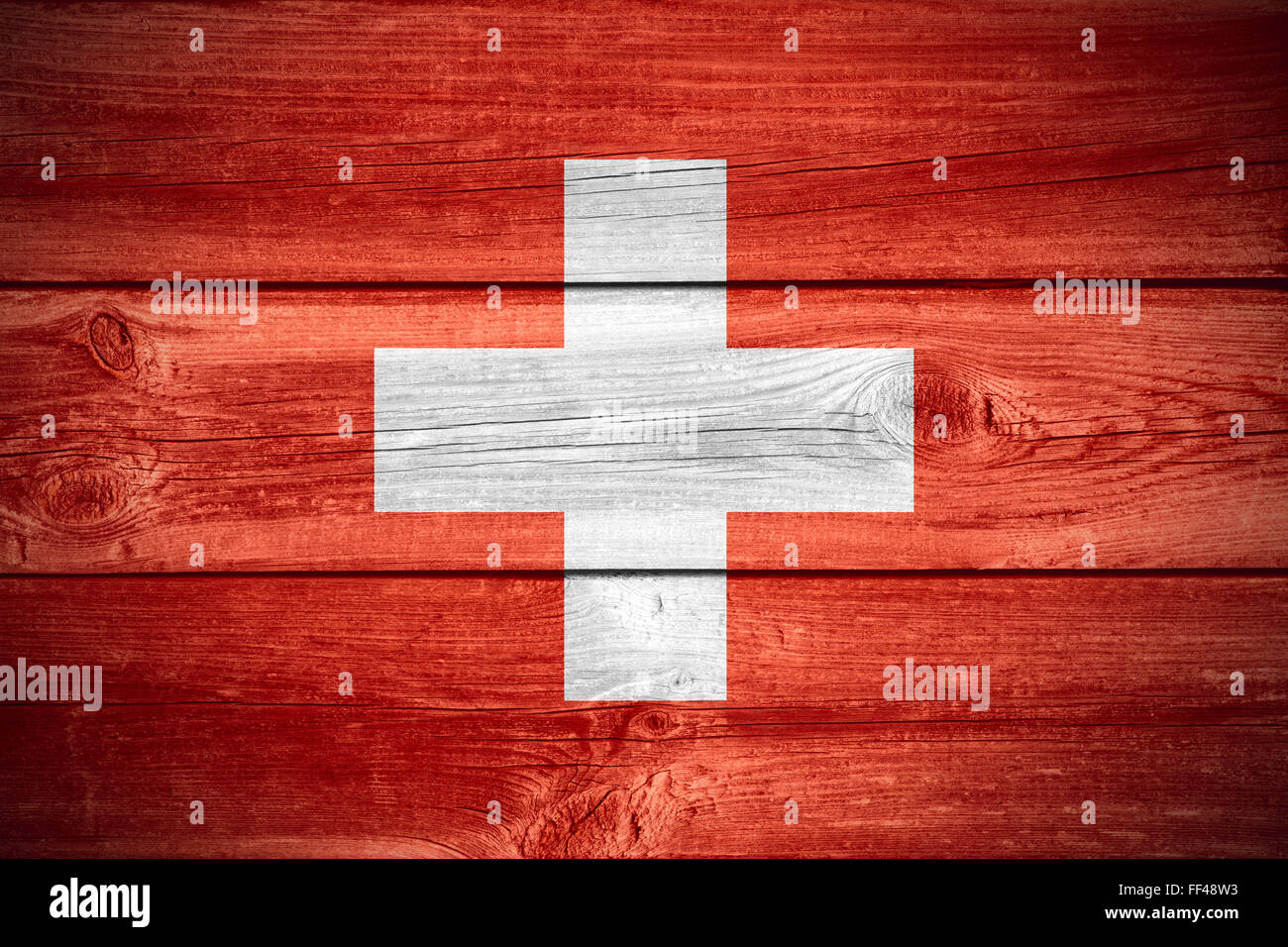 flag of Switzerland or Swiss banner on wooden background Stock Photo ...