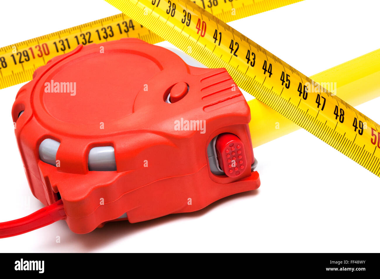 Red new tape-measure on a white background Stock Photo - Alamy